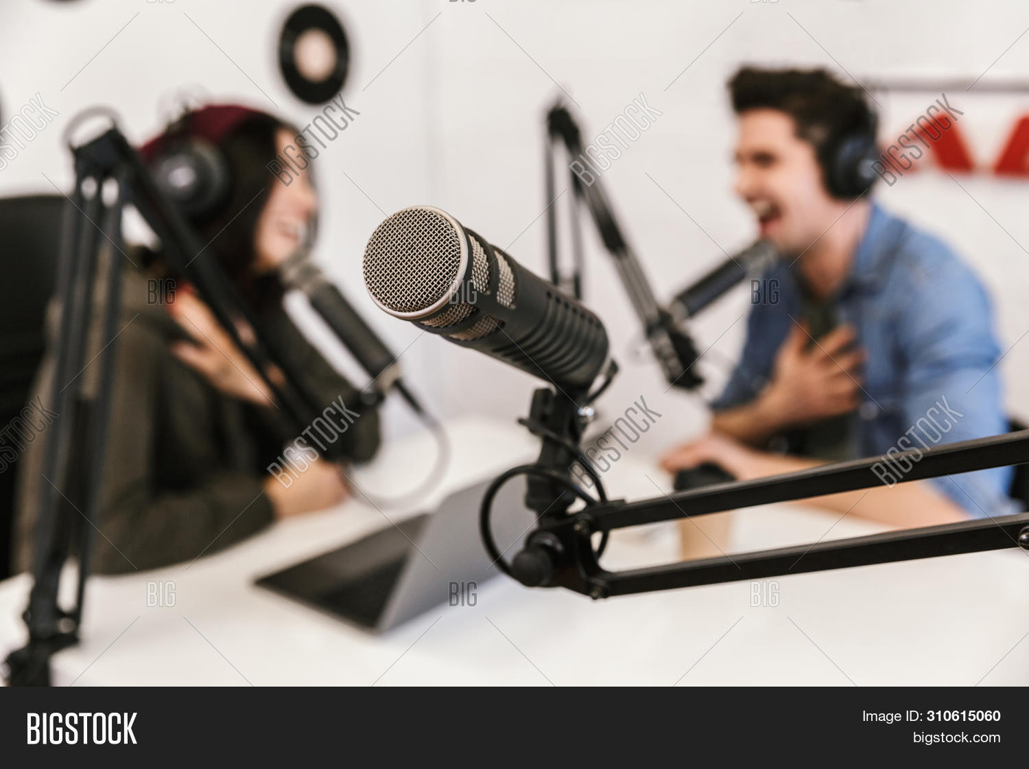 Two radio hosts moderating a live show for radio image & stock photo ...