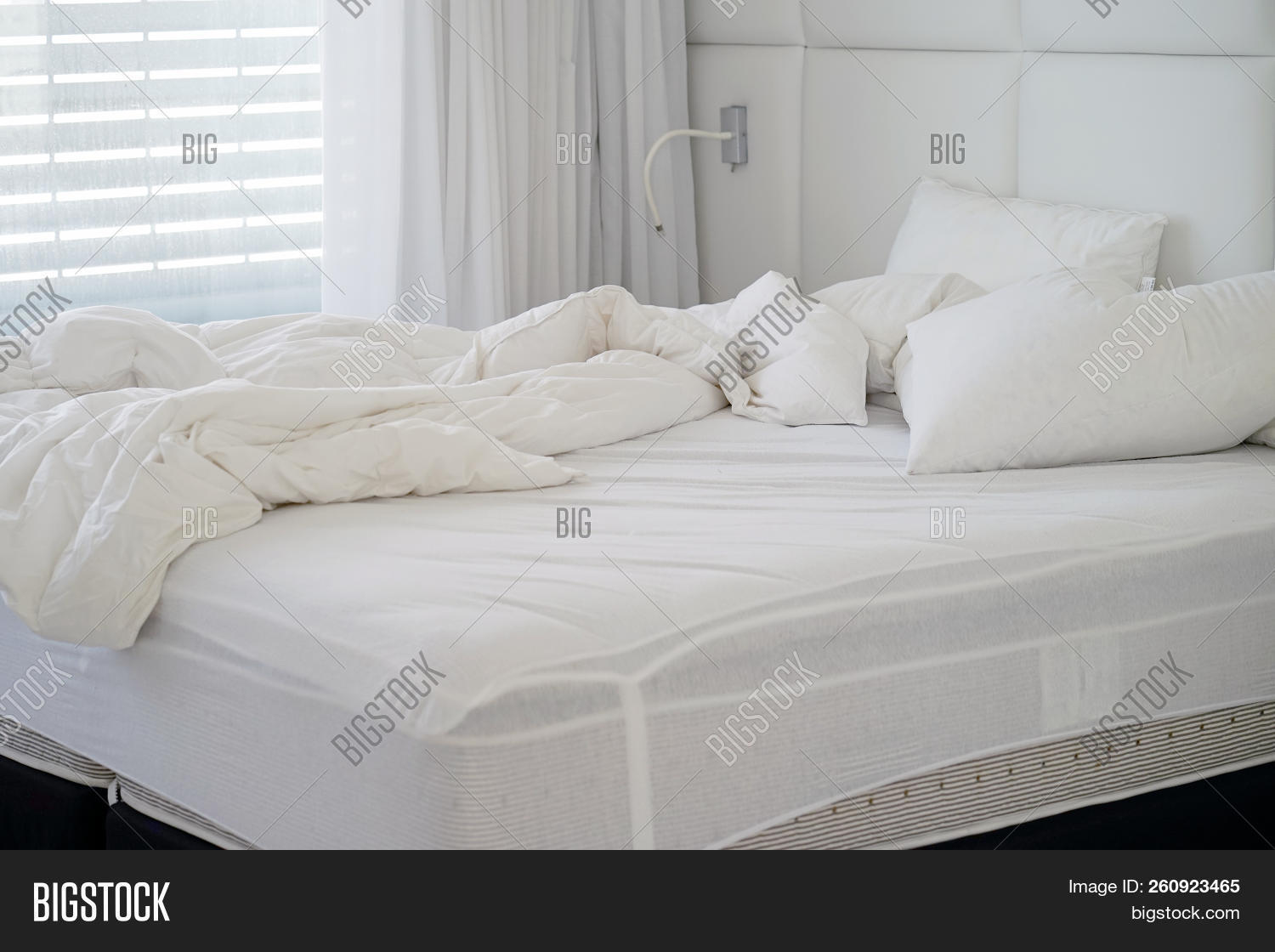 Crumpled Bed In The Hotel. Close-up Of Unfinished Or Messy Bed After ...