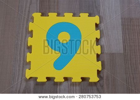 Yellow Puzzle Piece With Blue Nine Eight On Wooden Texture Laminate ...