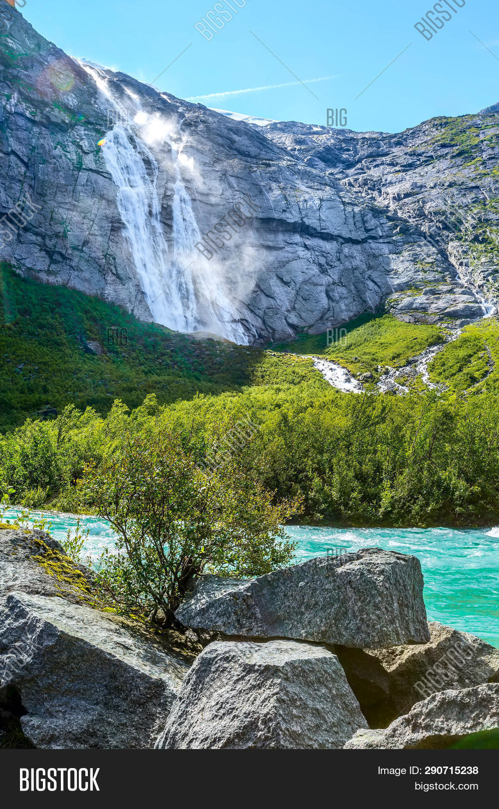Waterfall And Green Trees On The Way To Briksdal Or Briksdalsbreen ...
