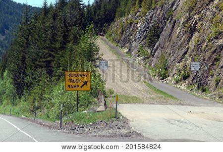 Runaway truck ramp in the forest on a mountain road, designed to slow ...