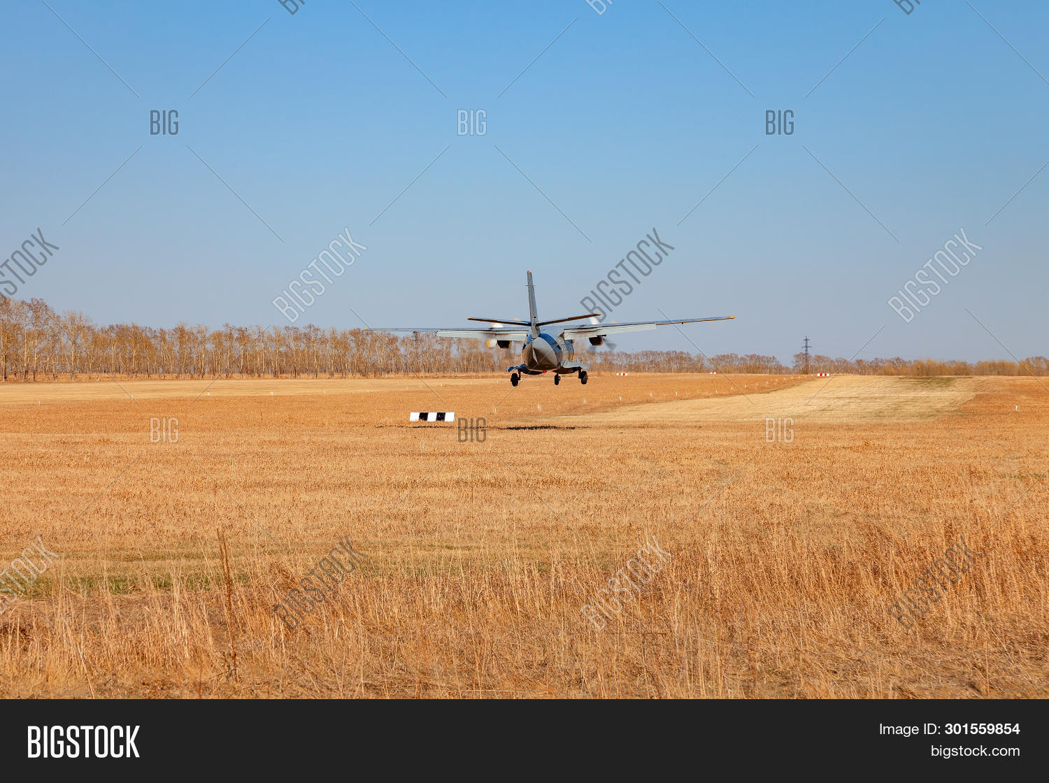 A Small Aircraft For The Transport Of Passengers And Paratroopers Lands ...