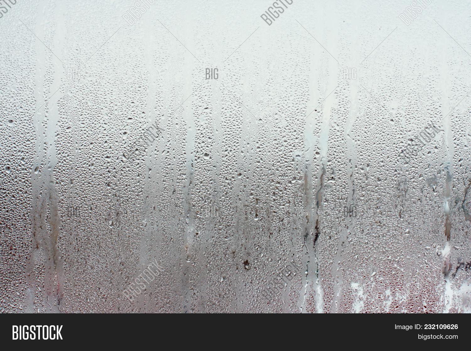 Water droplets condensation background of dew on glass window, humidity ...