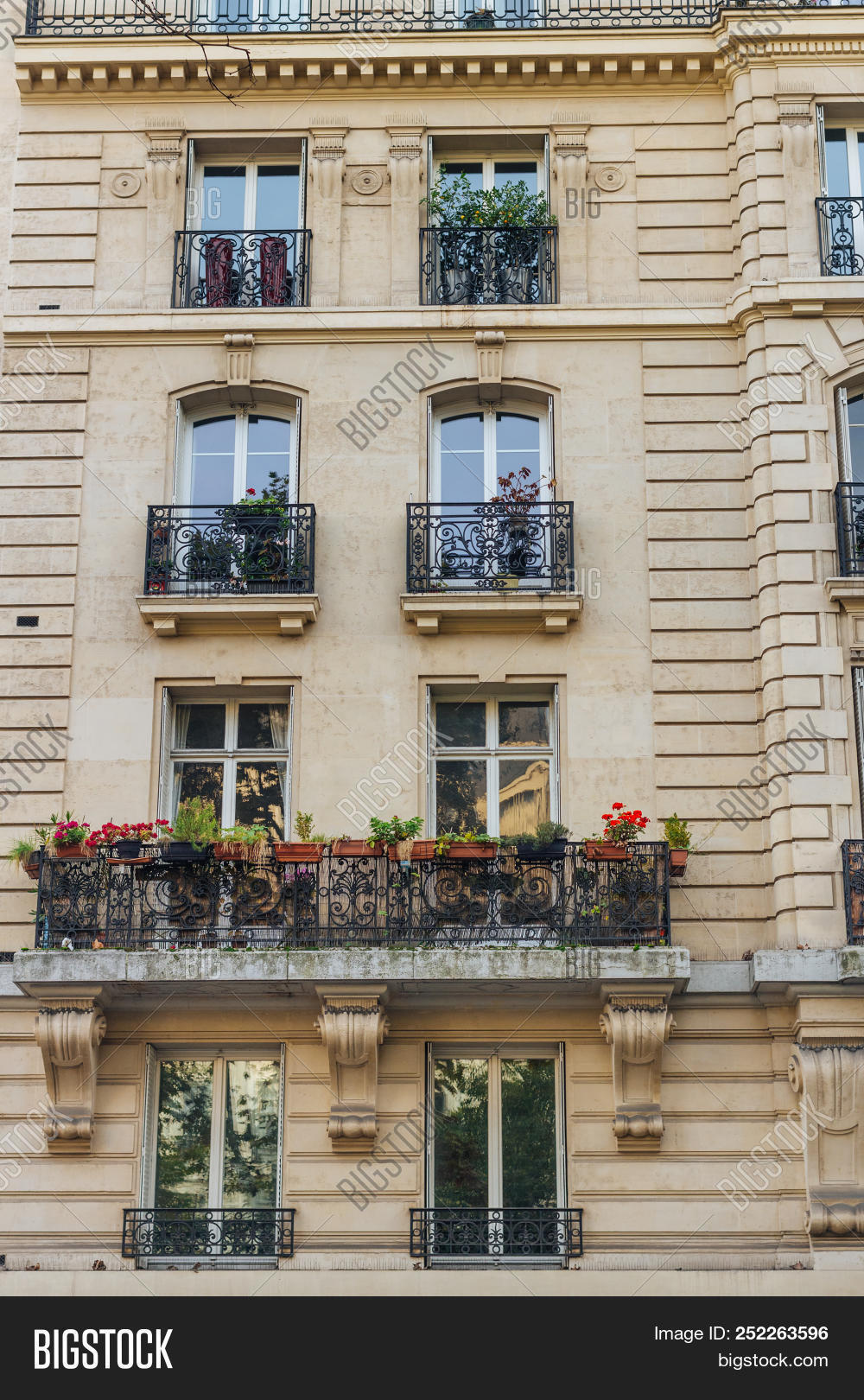 Old Paris Residential Buildings With Balconies And Flowers. Beautiful ...