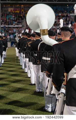 Details from a music band. Playing musicians with wind instruments and ...