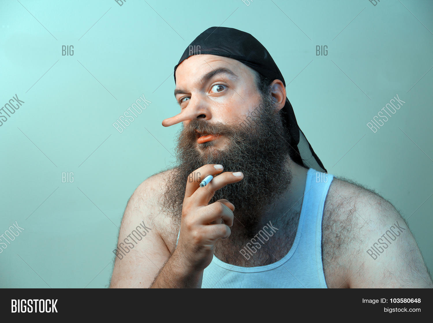 Intimidating redneck smokes ci image & stock photo. 103580648