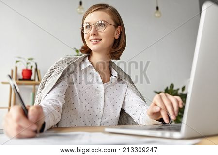 Portrait Of Beautiful Elegant Lady Dressed Formally, Busy Working, Sits ...