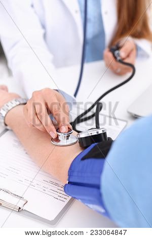 Female Doctor Arms Make Medic Procedure Closeup. Physical Cure Arterial ...