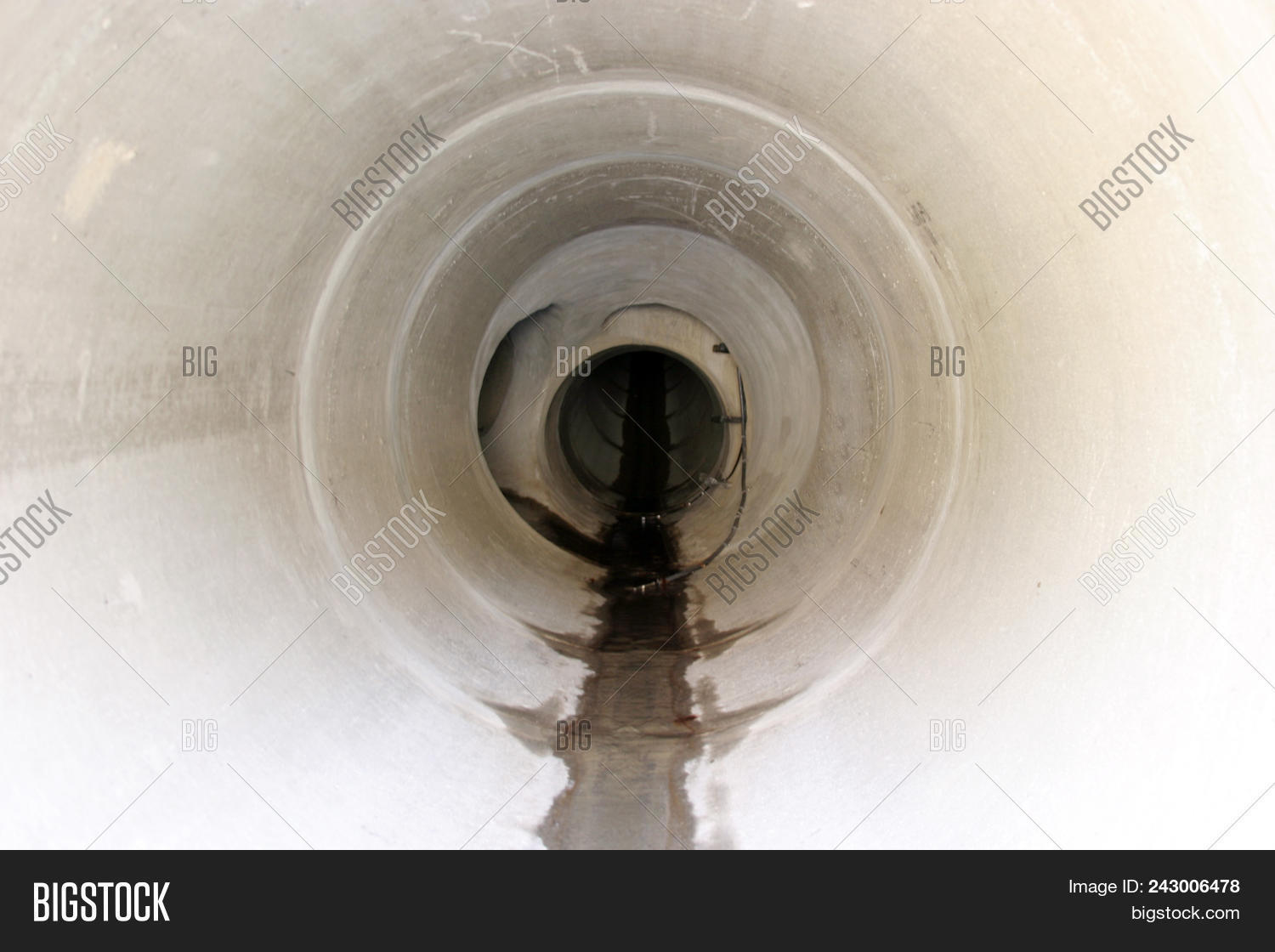Sewer Pipe or Storm Drain. Inside a sewer pipe or storm drain. image ...