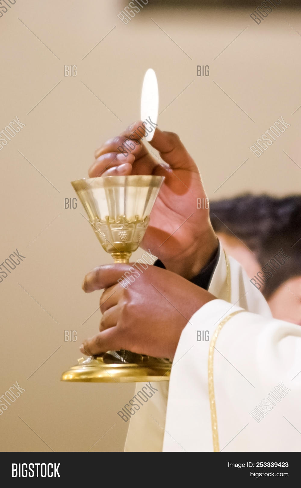 Hands Of The Missionary Consecrate The Holy Bread In The Body Of Christ And The Holy Wine In The ...