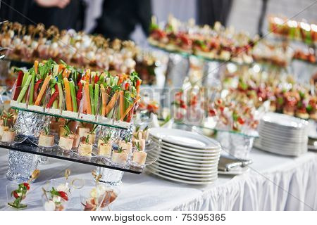 catering services background with snacks on guests table in restaurant ...