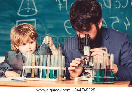 Back To School. Student Doing Science Experiments With Microscope In ...