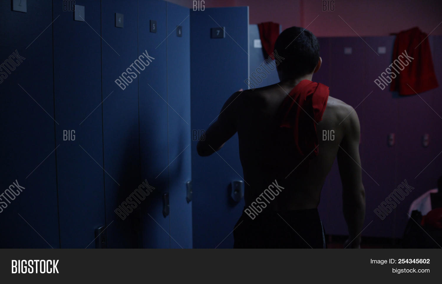 Disappointed And Tired Sportsman In Semi Lit Locker Room. Sad Athlete ...