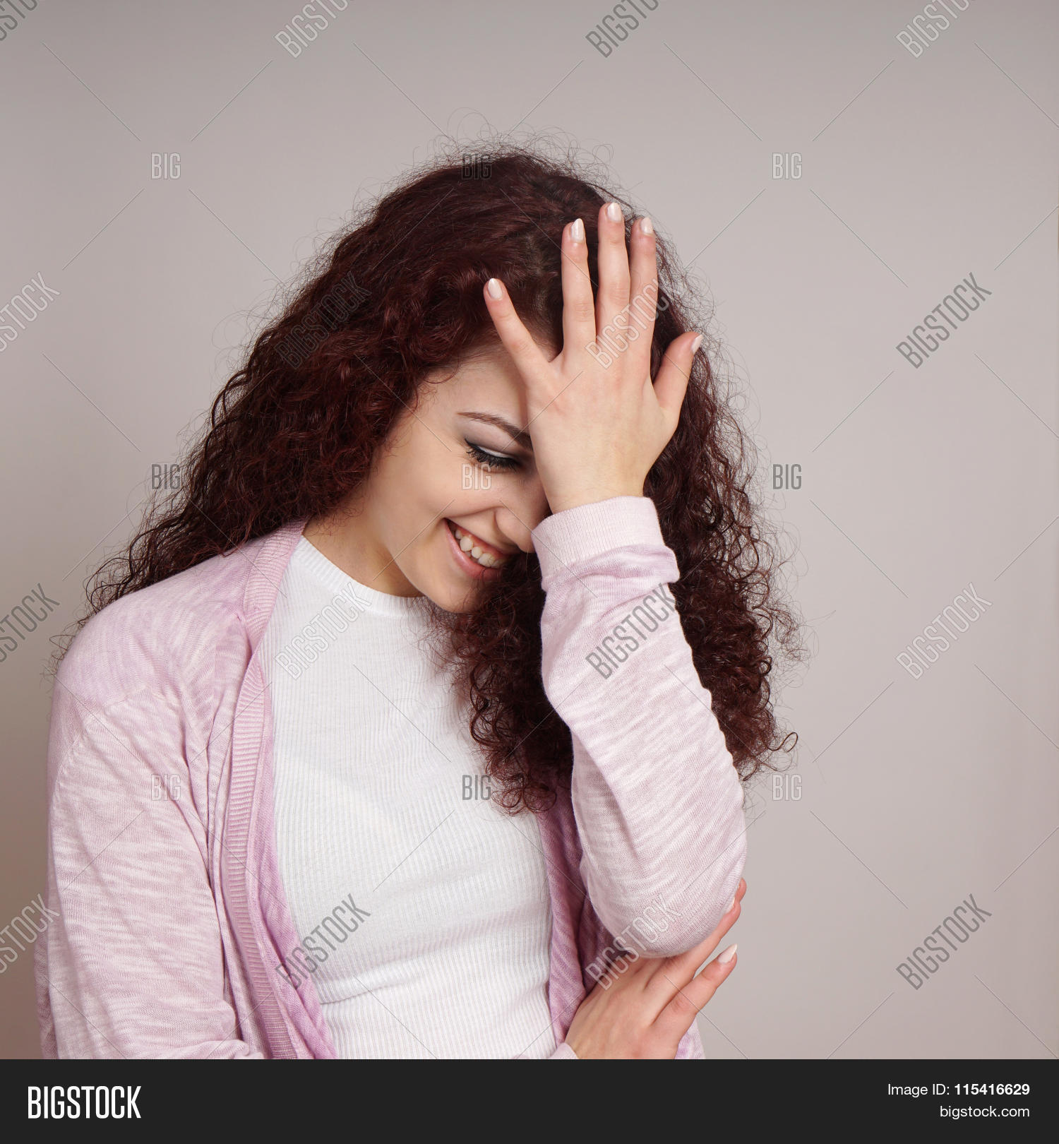 embarrassed young woman facepalm image & stock photo. 115416629