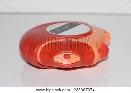 Asthma Inhaler. Metered Dose Inhaler. Orange Medication For Asthma ...