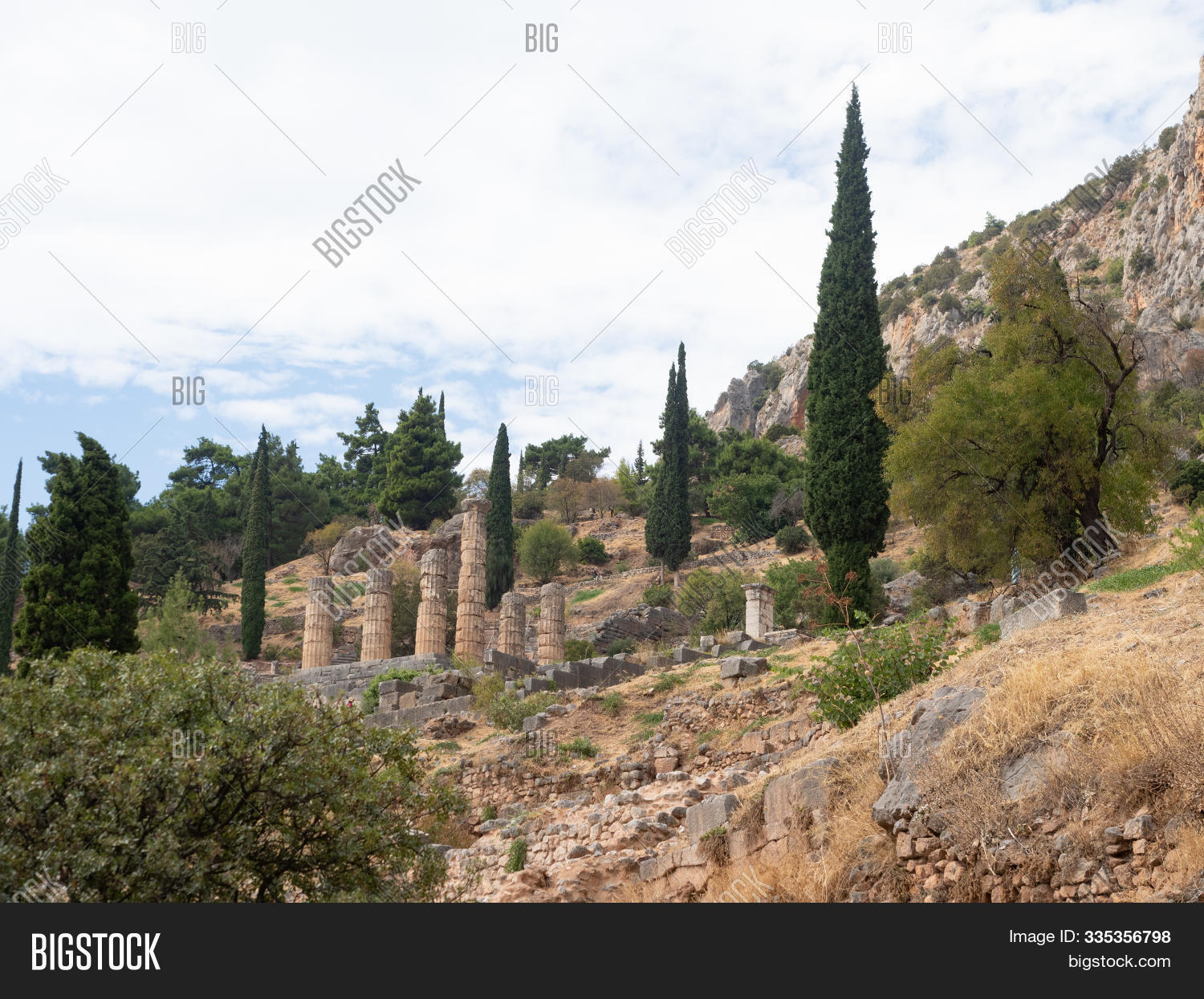 The Remaining Doric Columns Of The Oracle Of Delphi At The Temple Of Apollo On The Hillside Of the-remaining-doric-columns-of-the-oracle-of-delphi-at-the-temple-of-apollo-on-the-hillside-of