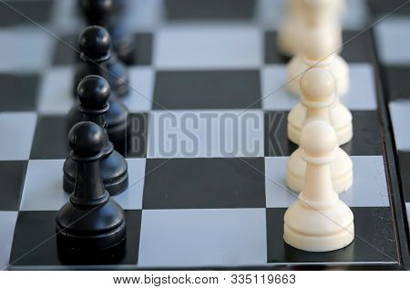 Chess Pieces On A Chessboard, The Royal Game Of Chess - Stock Image ...