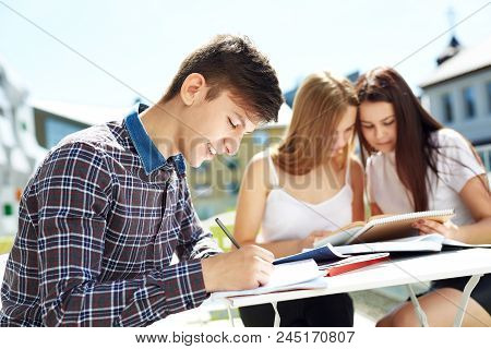 Three High School Students. Students Friends Learn, Do Homework ...