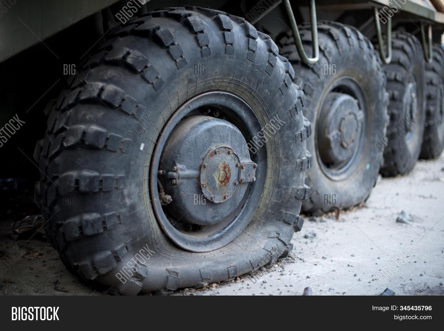 Wheels Of An Old Military Armored Personnel Carrier image & stock photo ...