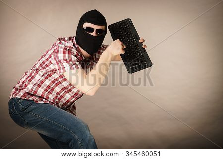 Crazy Hacker Man. Unrecognizable Guy Wearing Black Balaclava Holding ...