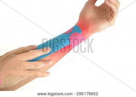 Kinesiology Taping On Woman Hand With Painful Area Highlighted In Red ...