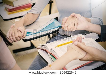 Students praying hands Images - Search Images on Everypixel