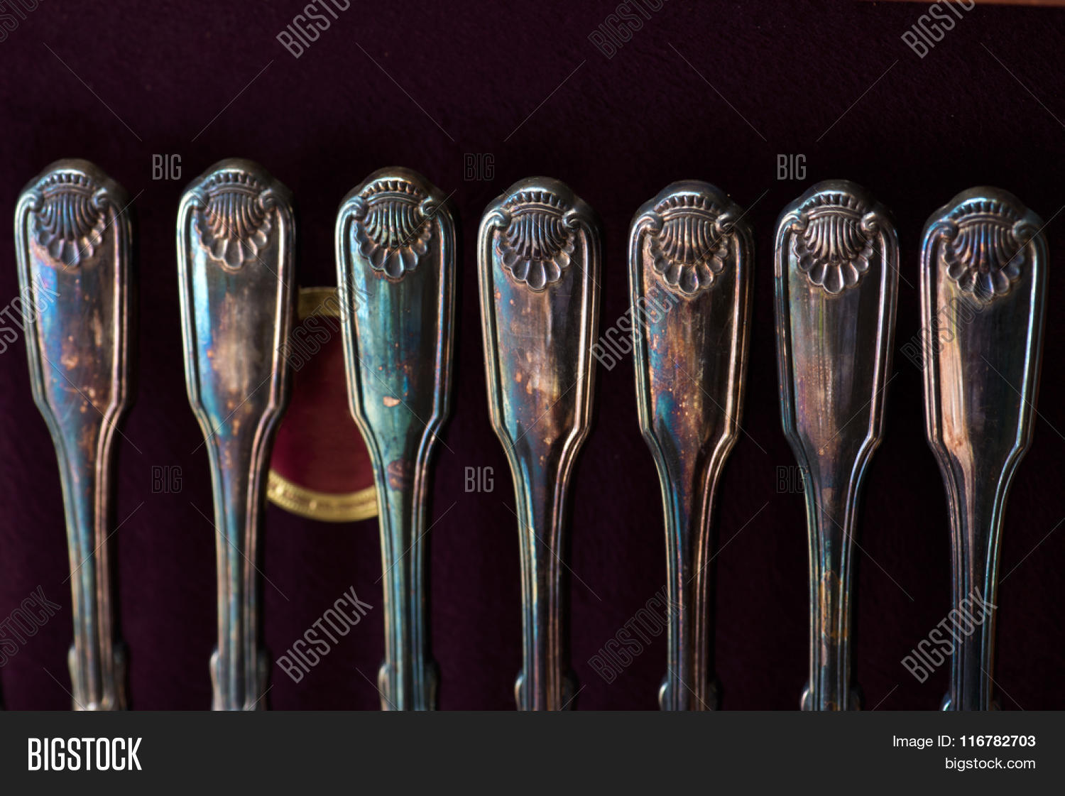 Old or vintage silverware. rainbow like patina and tarnish of old ...