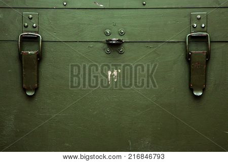 A green military storage box for ammunition. Green box from the war ...