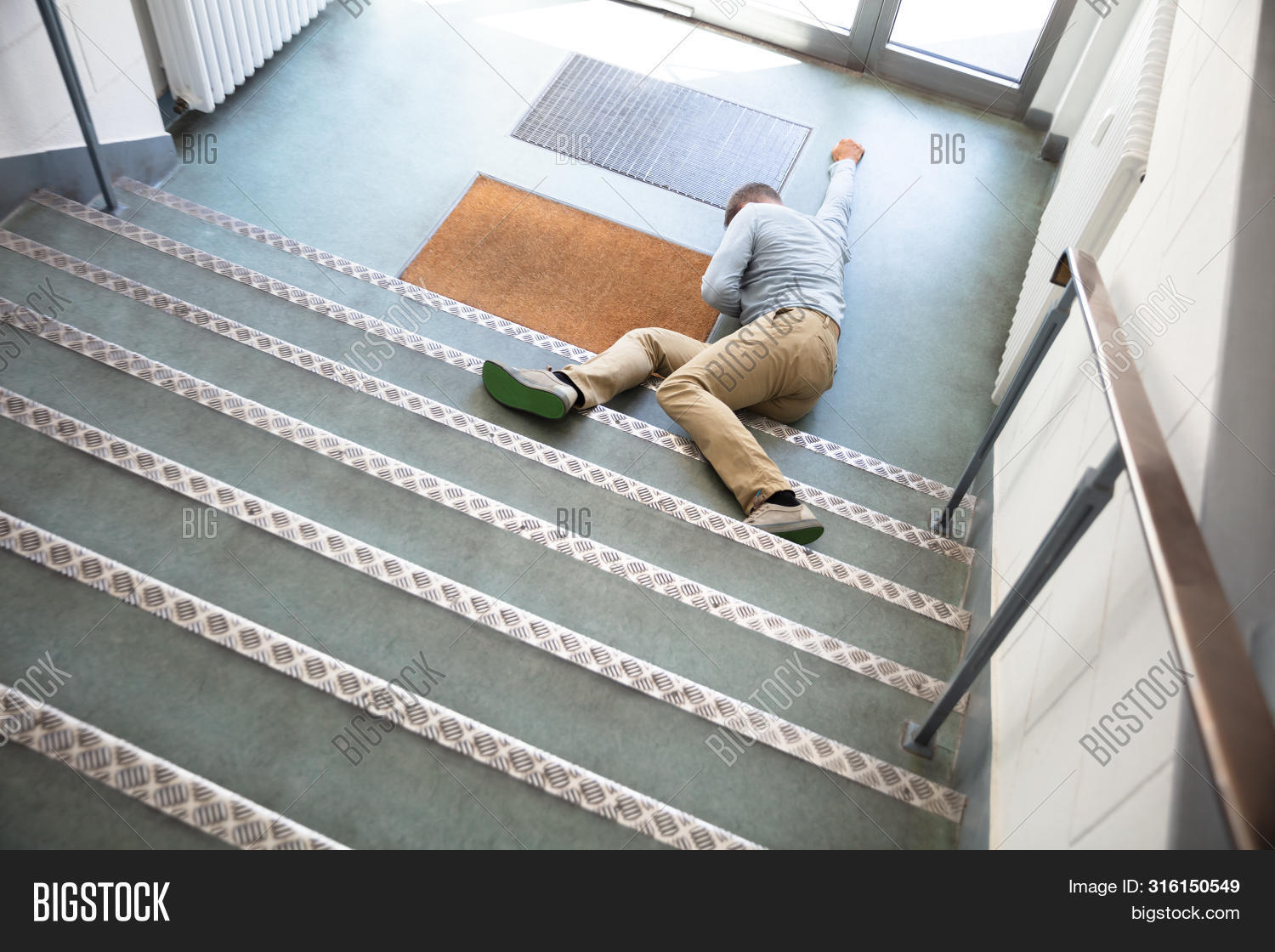 Unconscious Man Lying On Staircase After Slip And Fall Accident image ...
