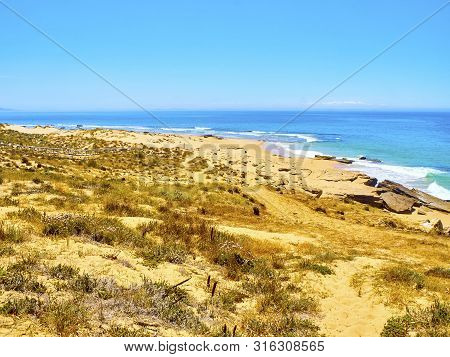 Panoramic View Of The Faro De Trafalgar Beach, A Broad Beach Of Fine ...