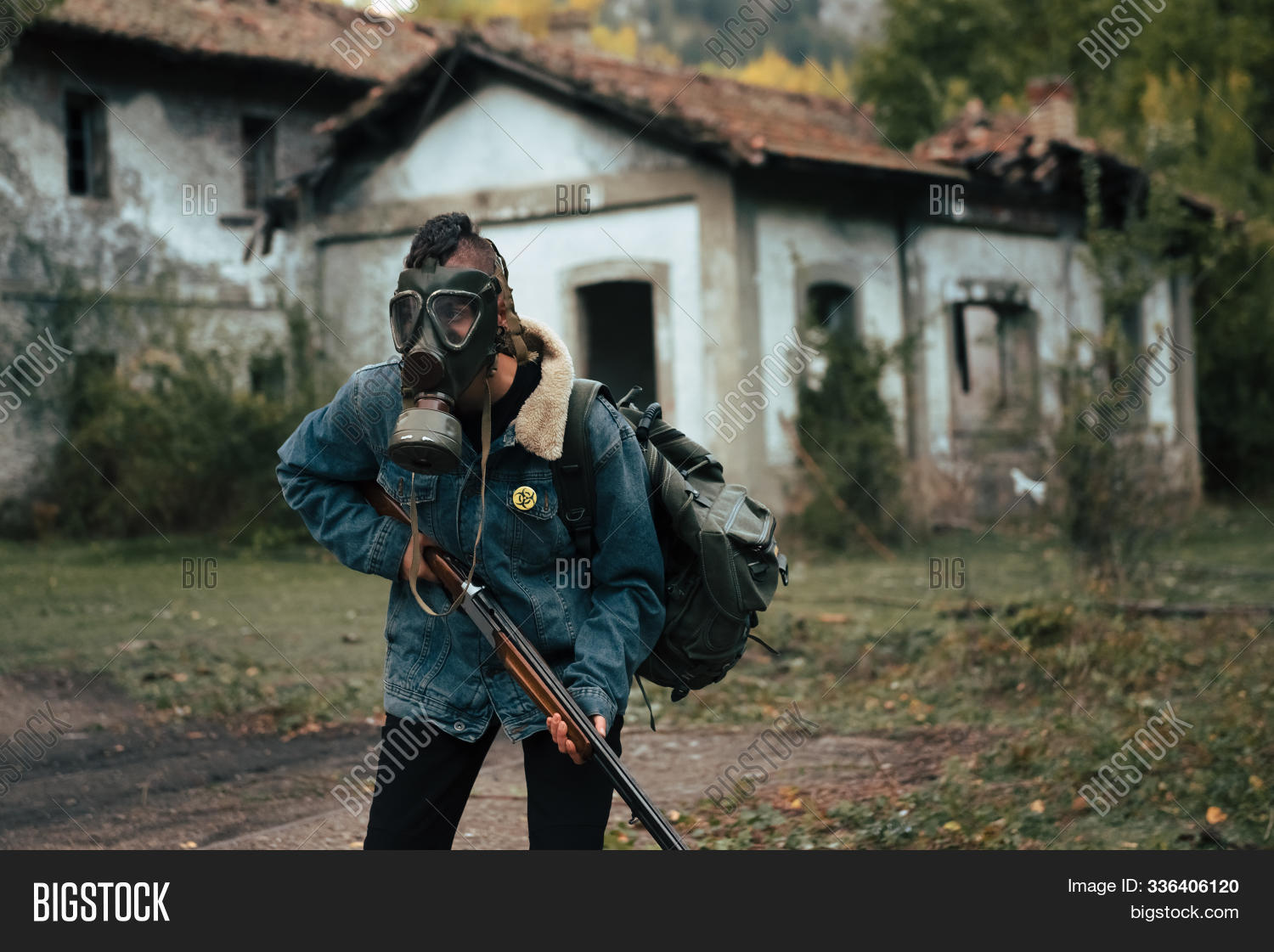 Woman With Gas Mask, Backpack And Double Barrel Shotgun. Post ...