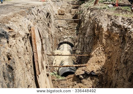 Replacement Of A Sewer Pipe Deep Under The Ground, Laying Pipes Under ...
