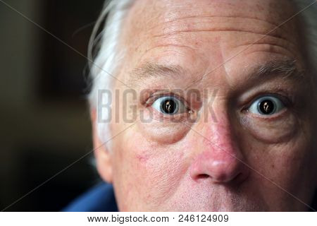 Dilated human eye. Man sees Death in his eyes in the form of a human ...