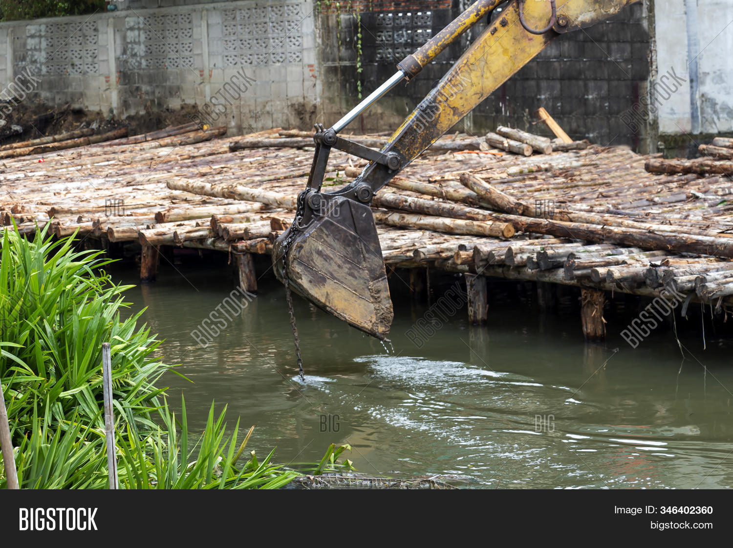 Excavator Or Digging Machine Working Bucket Digging Ground In Canal The ...