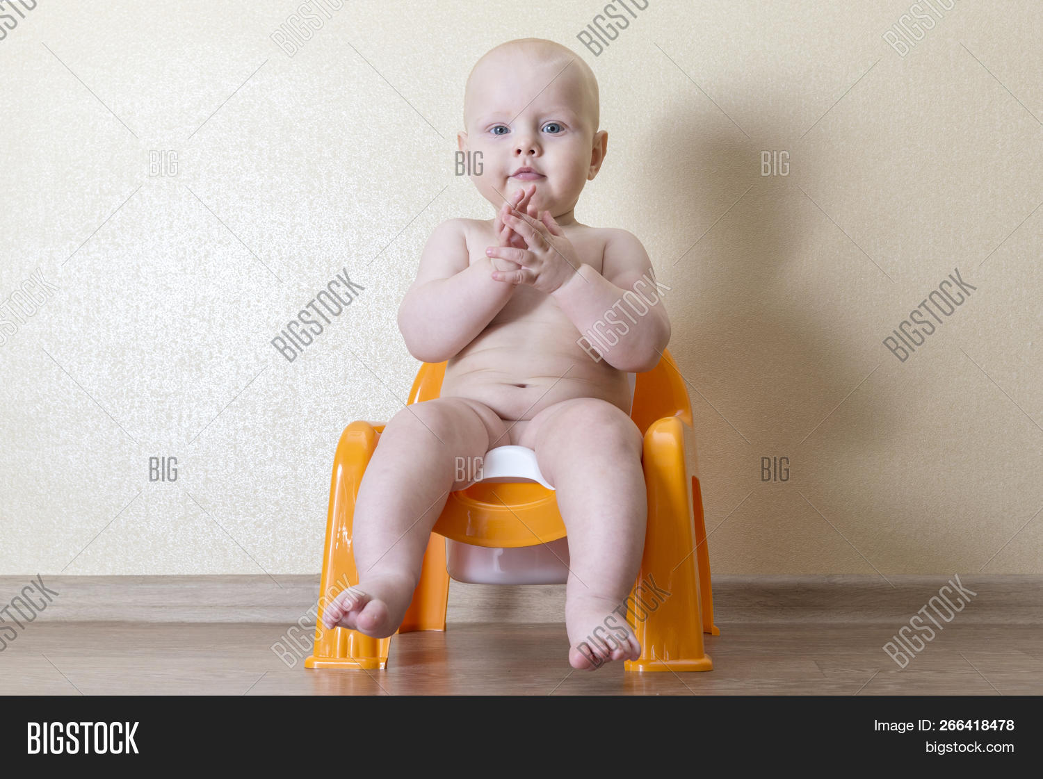 Naked Baby Sitting On A Pot For Boys image & stock photo. 266418478
