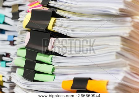 Close Up Pile Of Unfinished Homework Assignment Stacked In Archive With ...