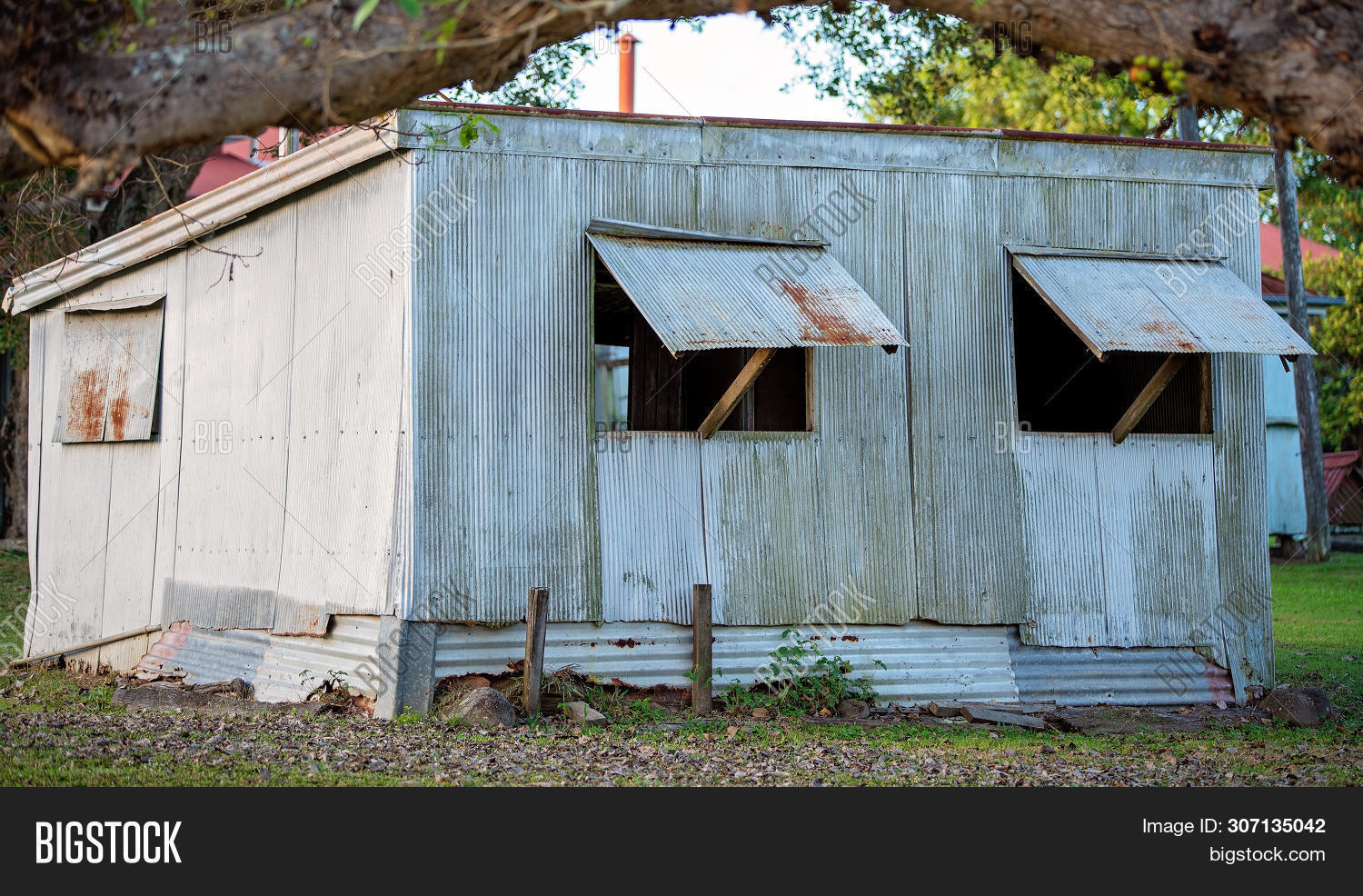 Abandoned Old Fashioned Iron Clad Country Shack With Push Up Windows ...