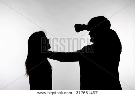 Domestic Violence And Abuse Concept - Silhouette Of Man Beating ...