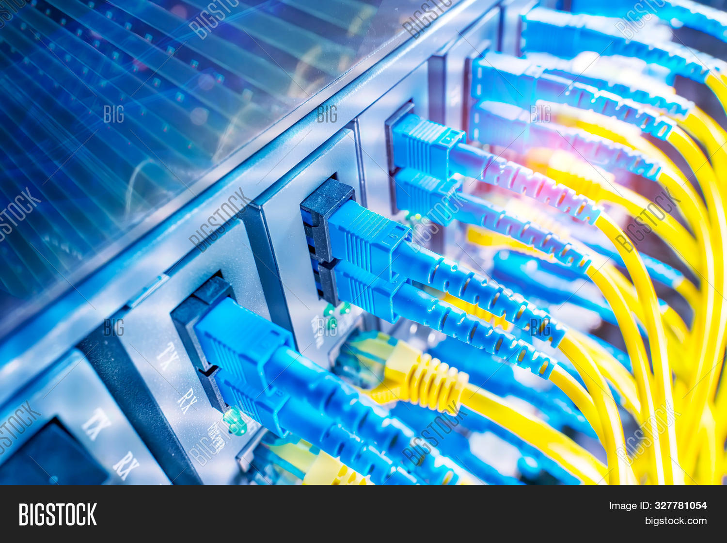 Fiber Optic cables connected to optic ports and UTP, Network cables ...
