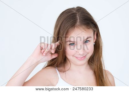 Emotion Face. Child Twisting Finger At A Temple Judging You Crazy ...