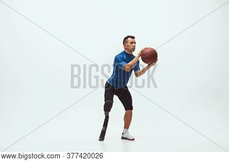 Athlete with disabilities or amputee on white studio background ...