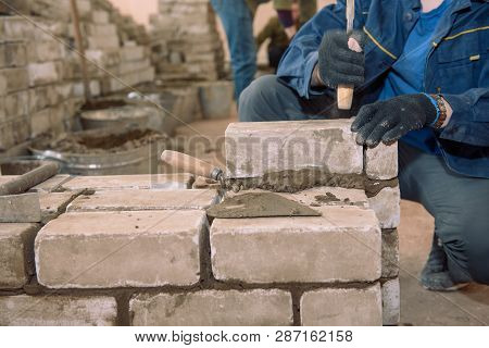 Build A Wall Of Bricks. Students Learn To Lay Bricks. Cement Bond ...