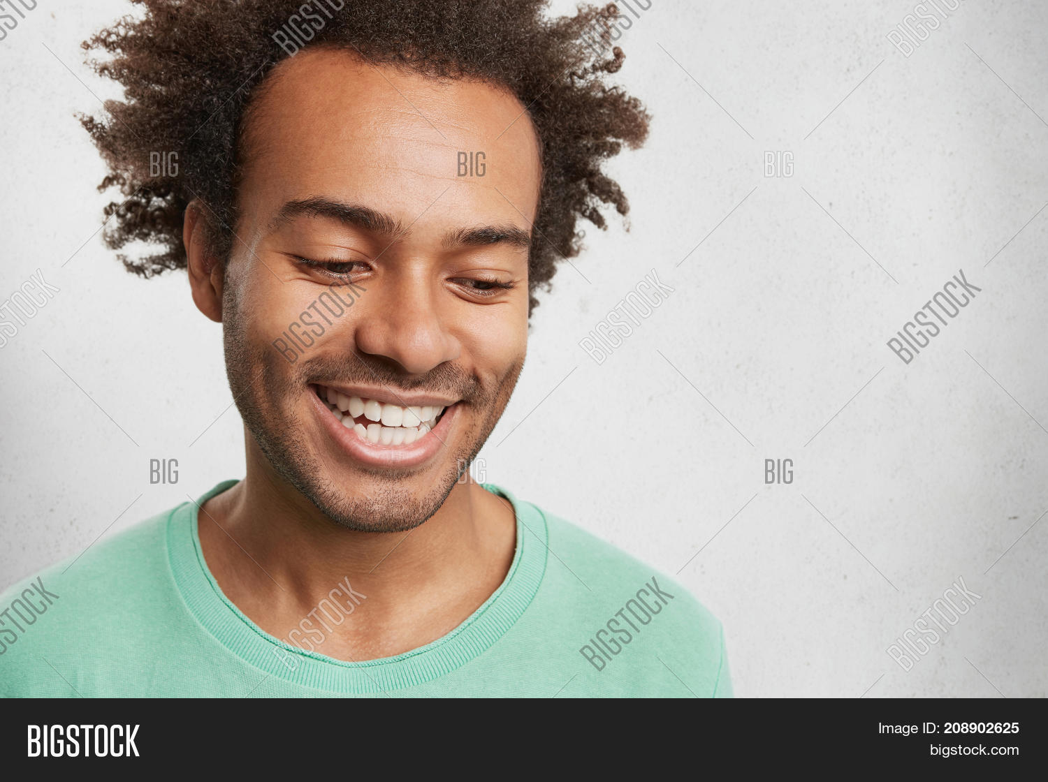 Headshot Of Shy Dark Skinned Male With Crisp Hair, Smiles Broadly ...