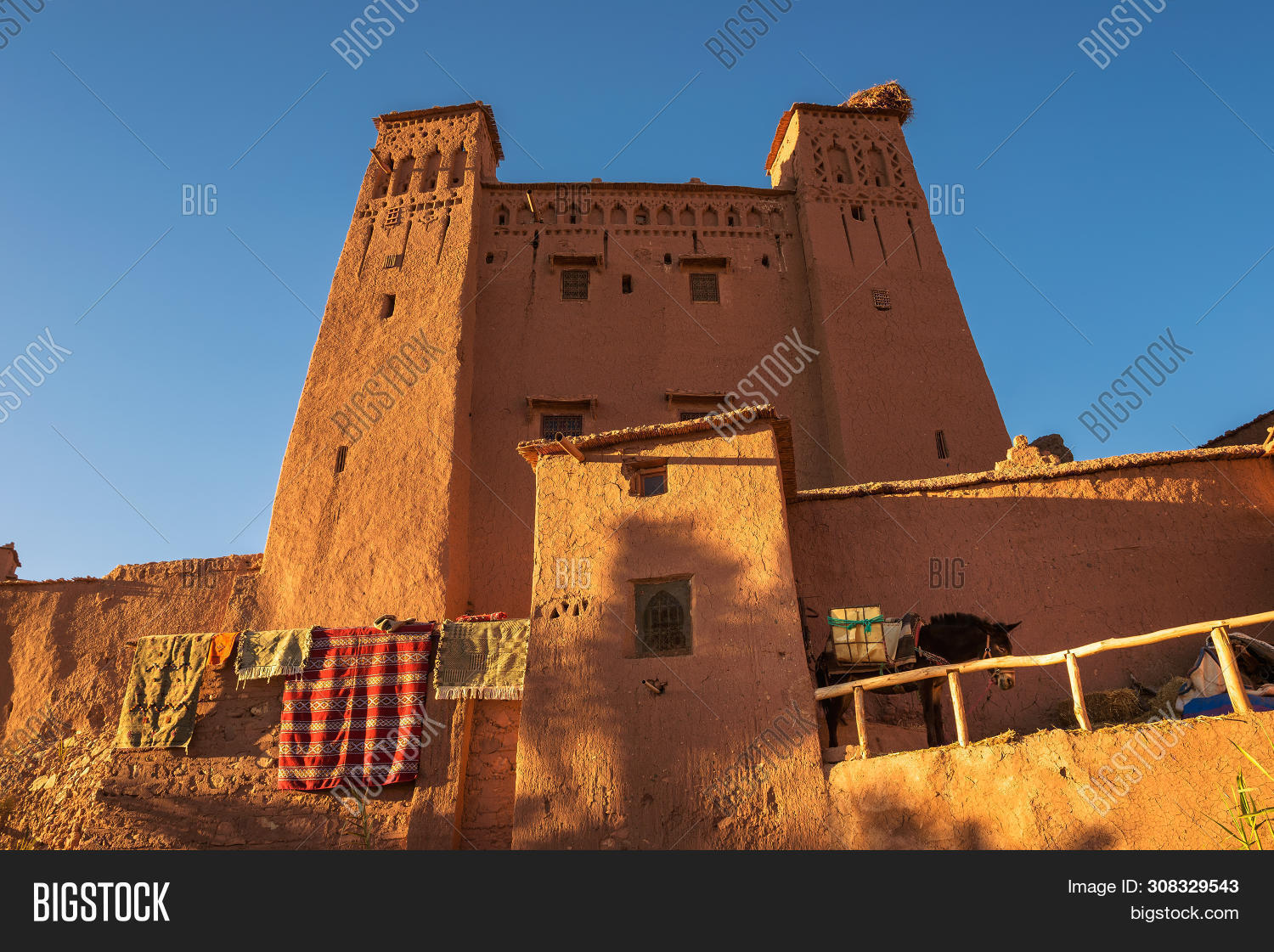 Ancient Castle In Ait Benhaddou In Morocco At Sunset. This Fortified ...