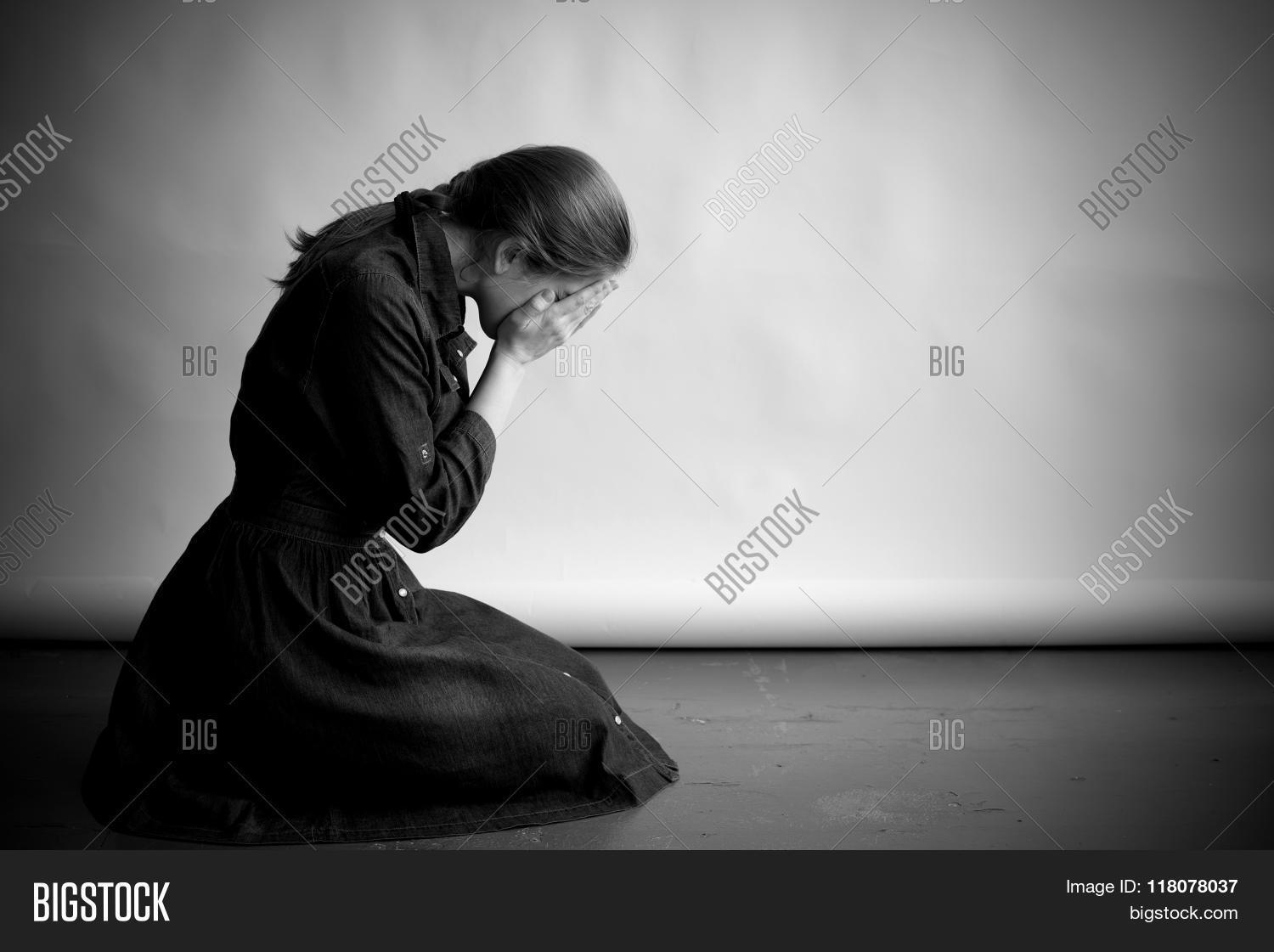 Crying woman in monochrome image & stock photo. 118078037