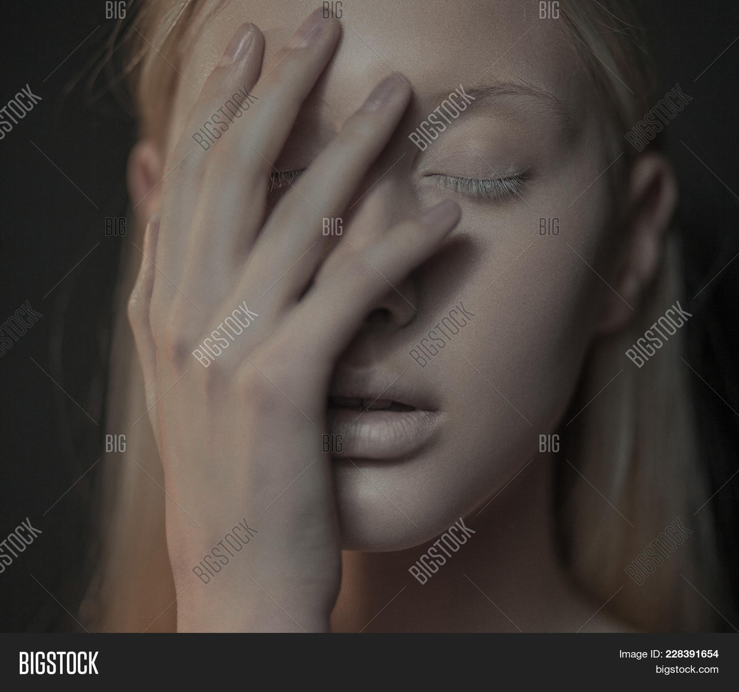 Portrait Of Young Albino Woman With Closed Eyes On Dark Background. She ...
