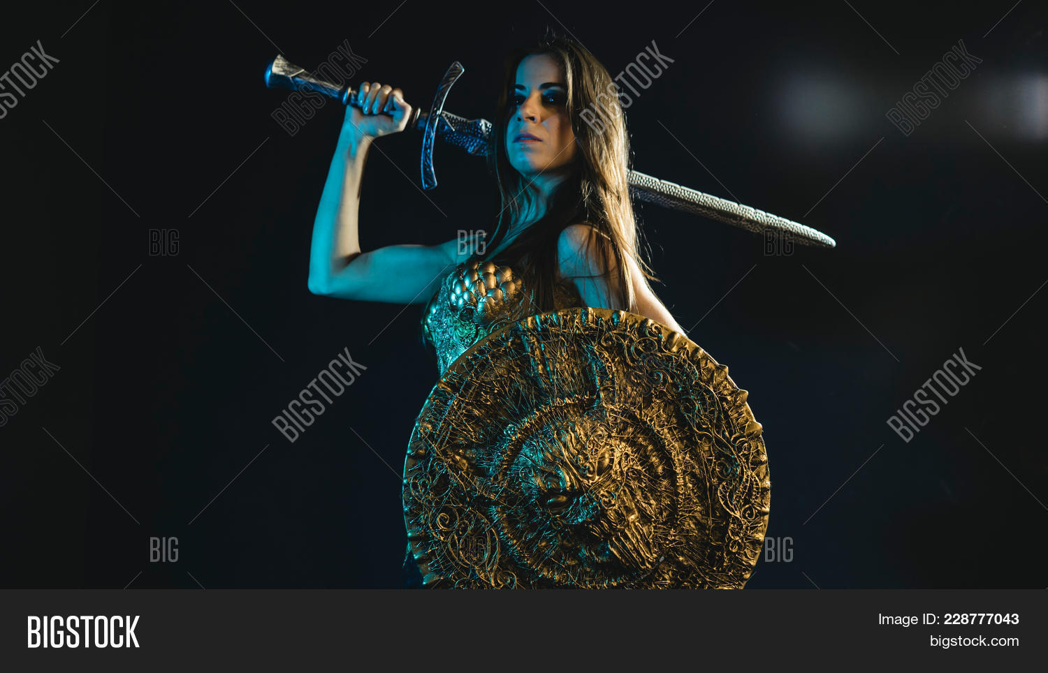 valkyrie warrior, woman with golden armor iron coat and big warrior ...