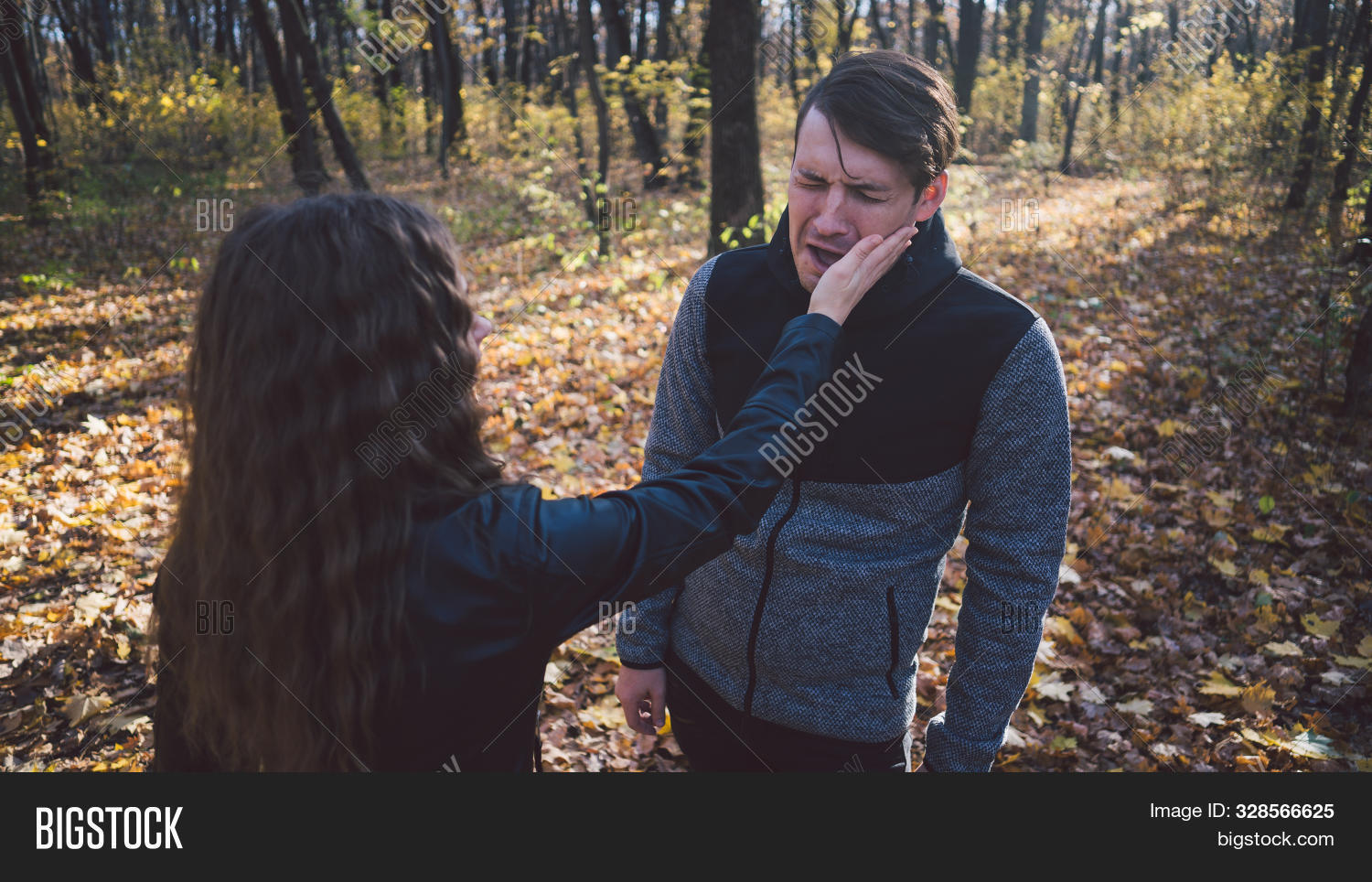 Man Getting Slapped In The Street. Unhappy Scared Man Getting Slapped ...