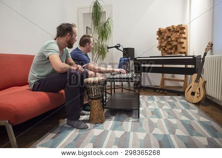 Two Professional Musician Recording And Playing Instruments In Digital ...