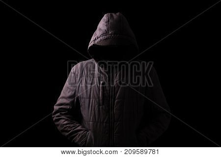Scary and creepy man hiding in the shadows, with the face and identity ...